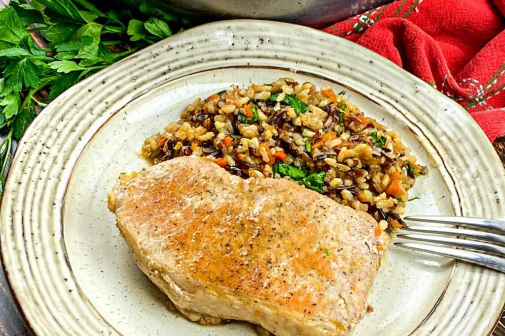 Boneless Pork Chops with Wild Rice Pilaf Skillet - wellnesssleuth